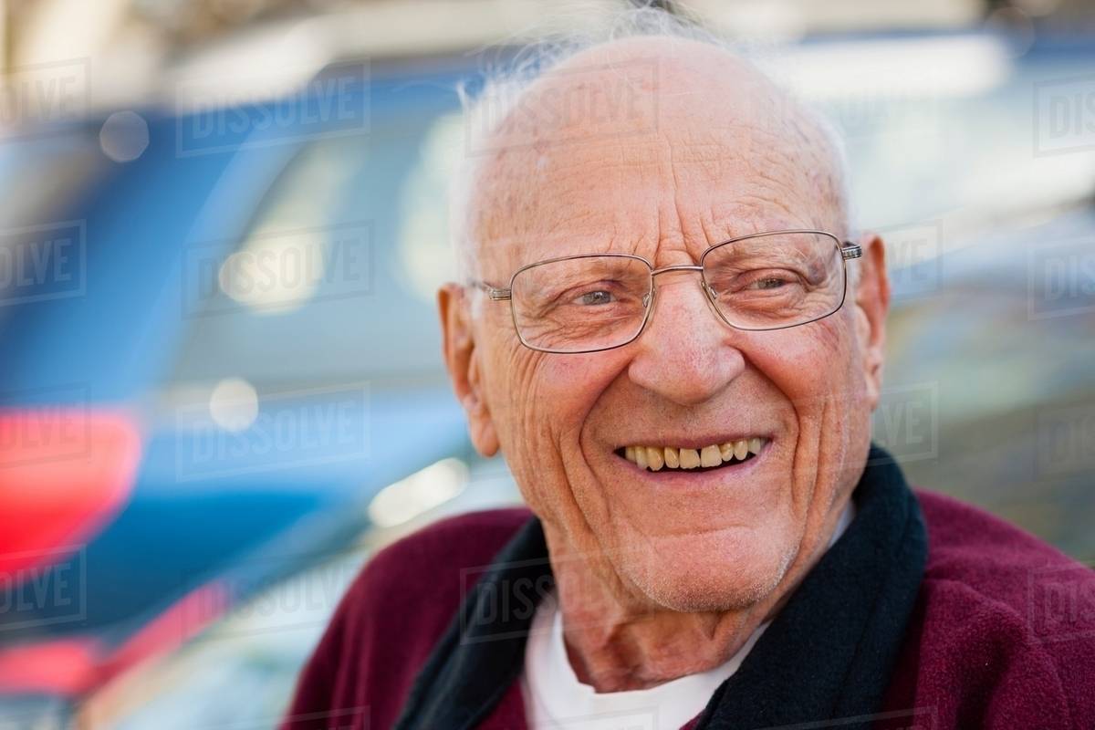 Close up of older man's smiling face - Royalty-free Stock Photo | Dissolve