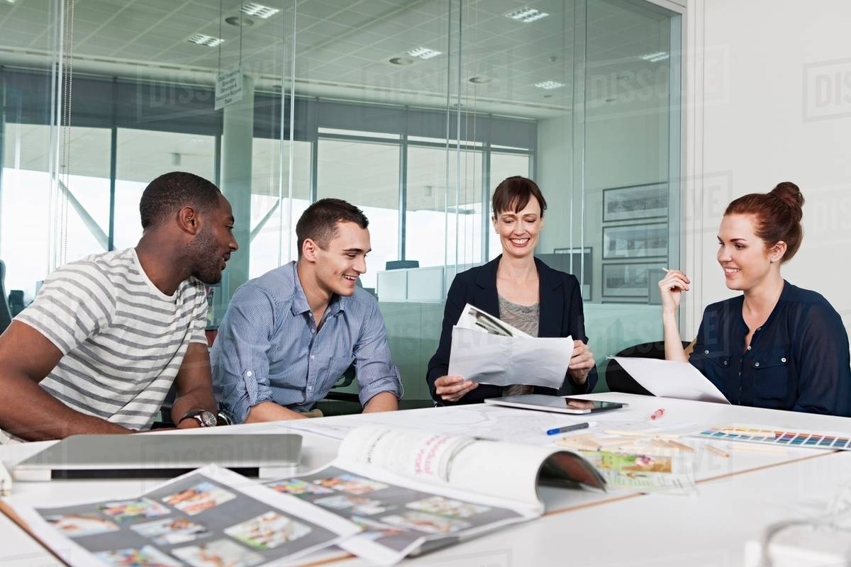 Colleagues planning during creative meeting - Stock Photo - Dissolve