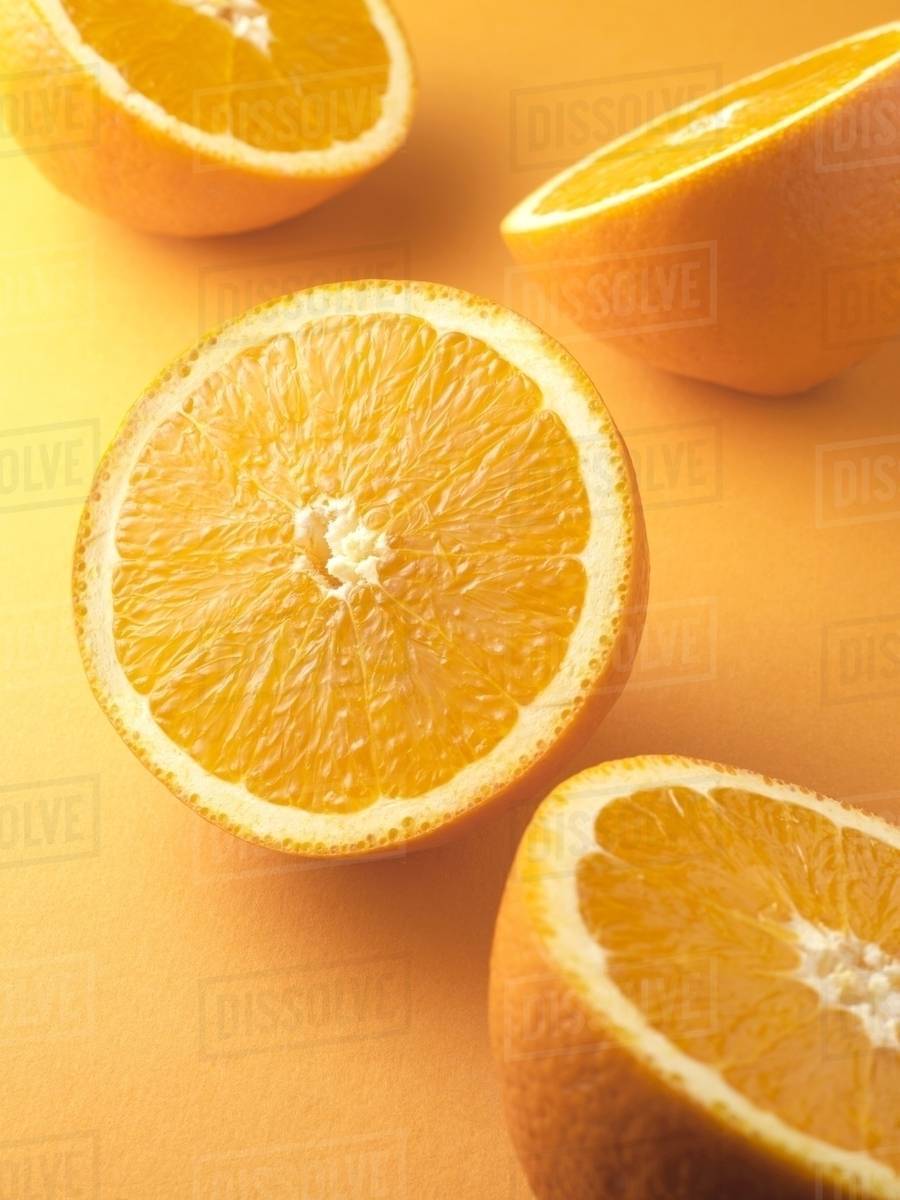 Orange halves - Royalty-free Stock Photo | Dissolve