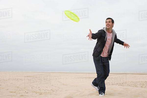 Man throwing a flying disc - Royalty-free Stock Photo | Dissolve