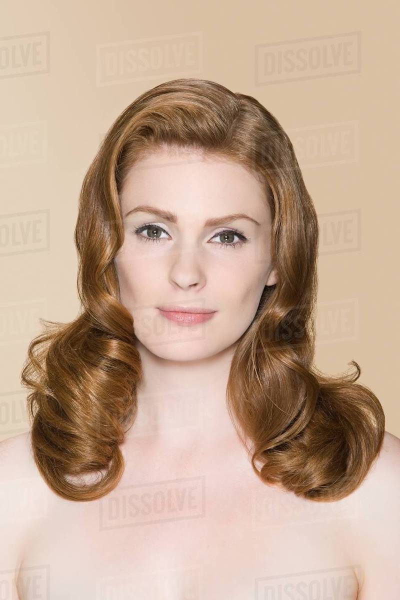 Portrait of a woman with ginger hair - Stock Photo - Dissolve