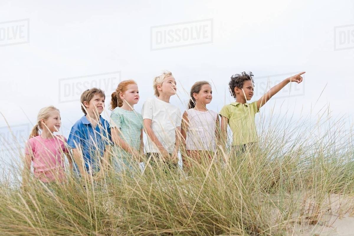 Portrait of friends in a row - Royalty-free Stock Photo | Dissolve