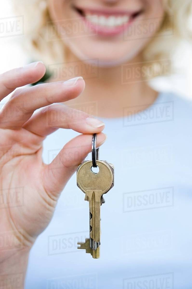 Woman with keys - Royalty-free Stock Photo | Dissolve