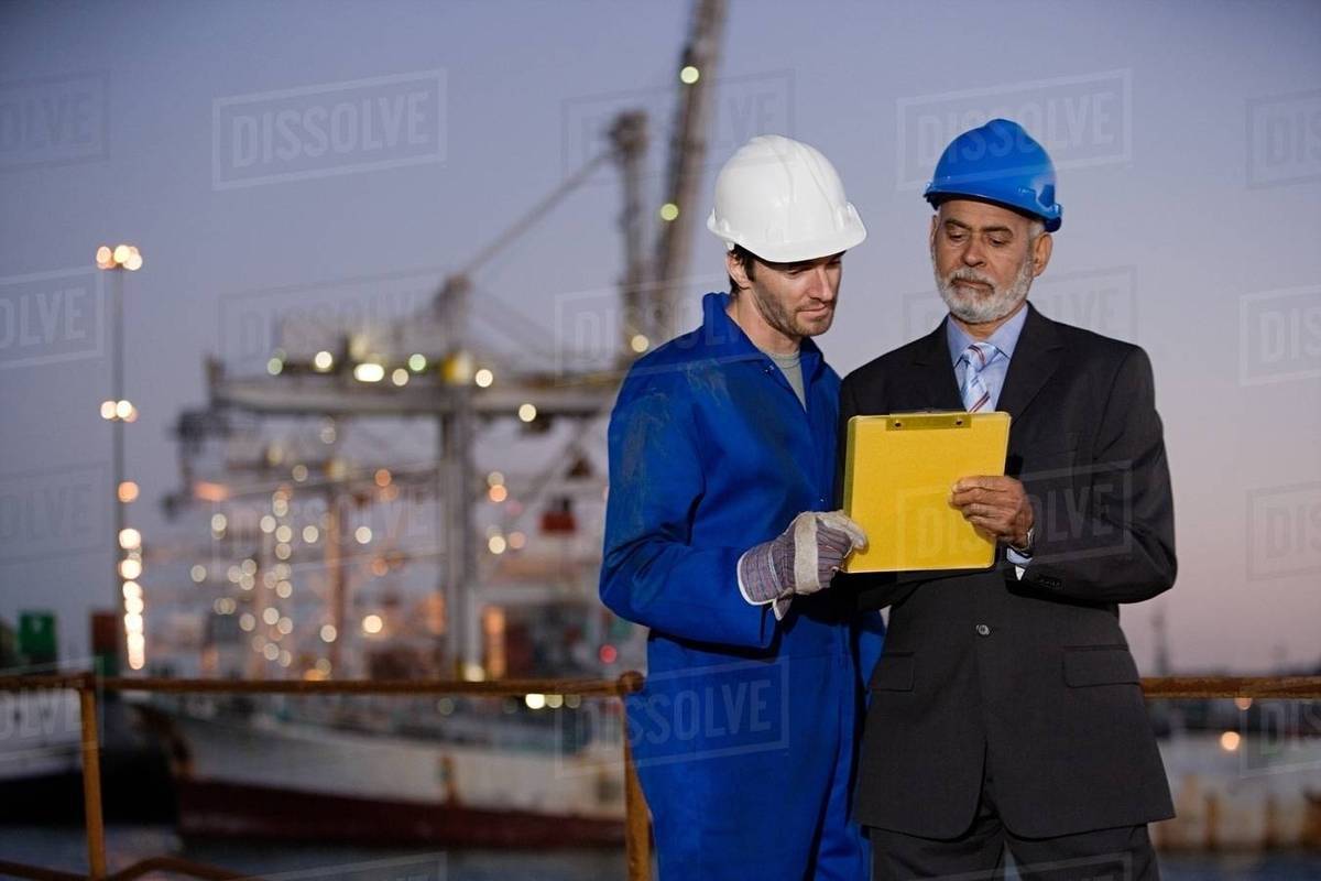Working at harbour - Royalty-free Stock Photo | Dissolve