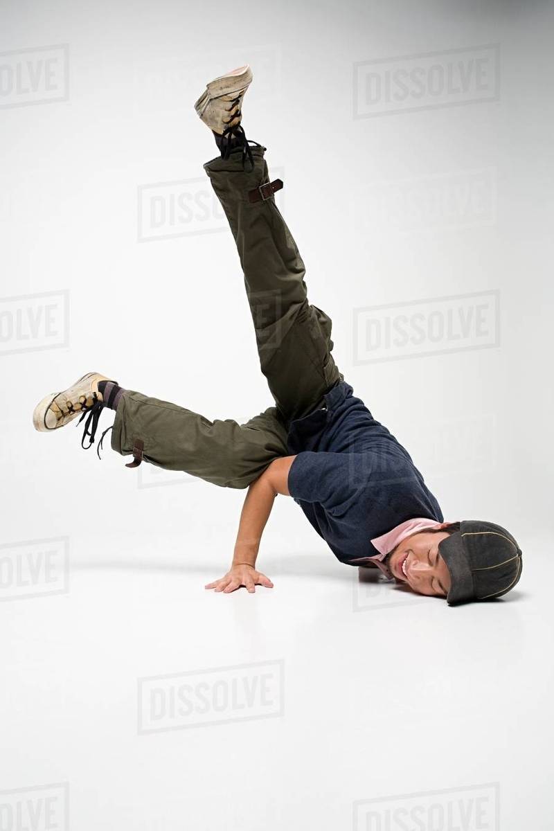 Young man breakdancing - Royalty-free Stock Photo | Dissolve