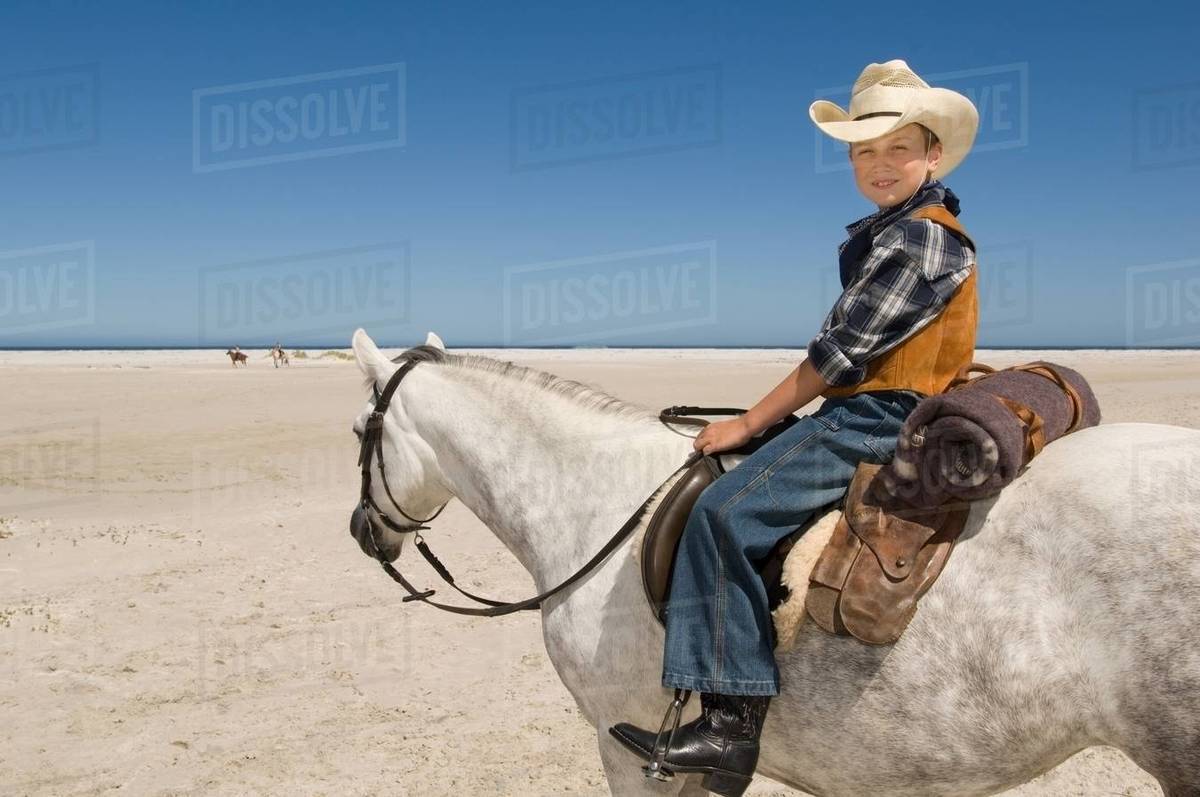 A boy riding a horse - Royalty-free Stock Photo | Dissolve