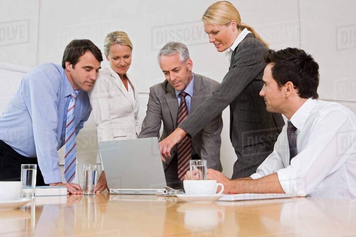 Business colleagues in a meeting - Stock Photo - Dissolve