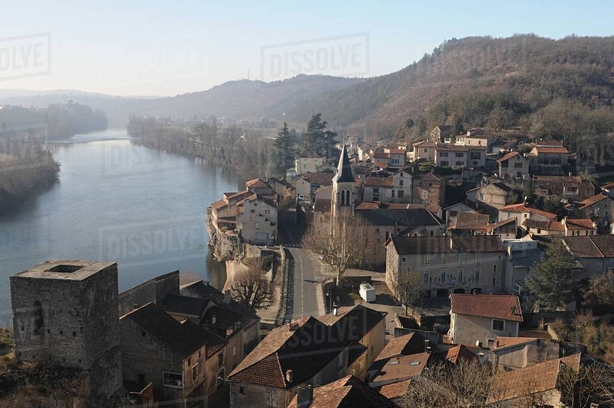 Village by river - Royalty-free Stock Photo | Dissolve