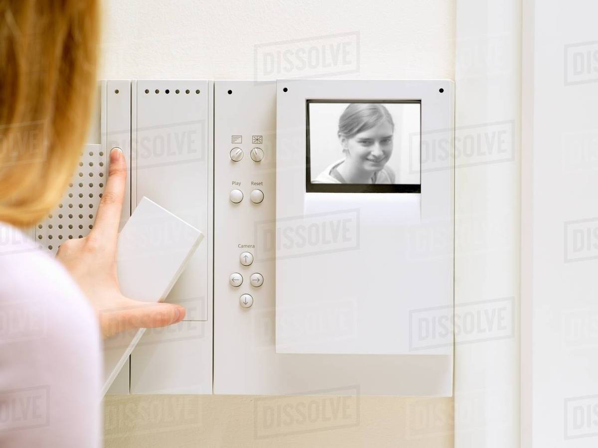 Person using intercom - Royalty-free Stock Photo | Dissolve