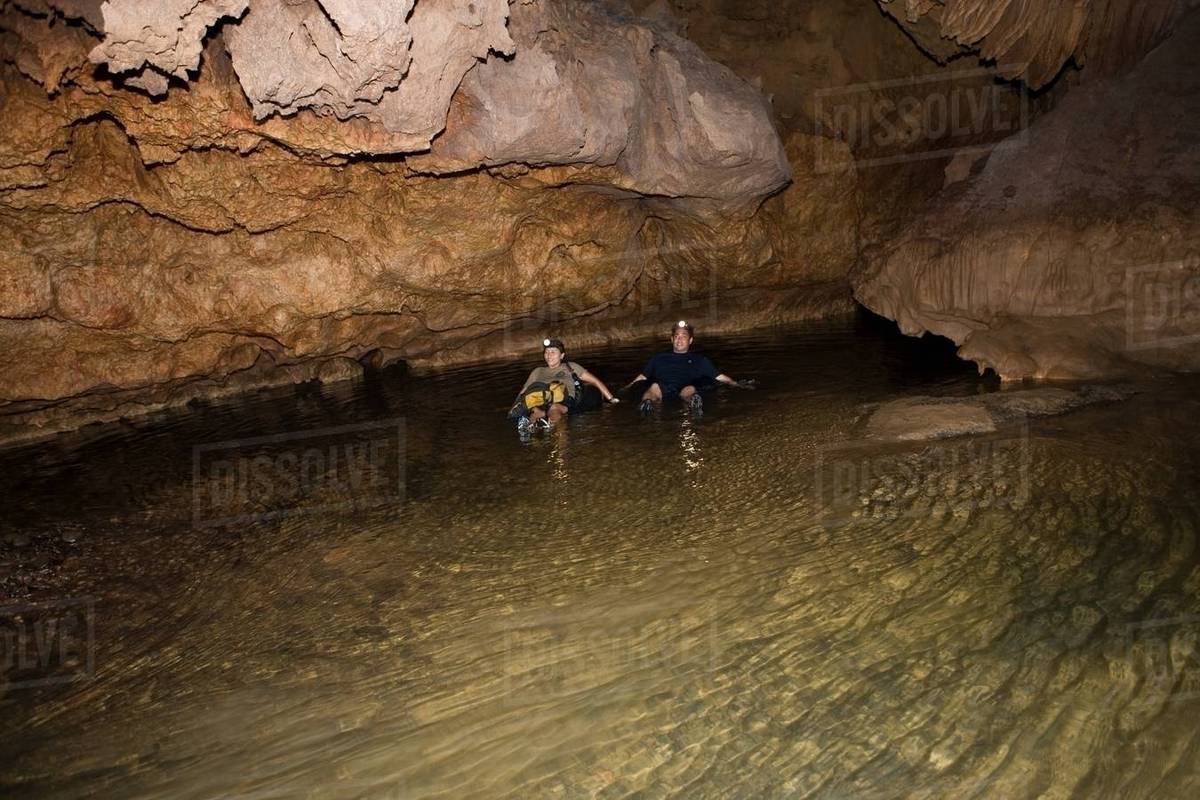 Rafting an underground river. - Royalty-free Stock Photo | Dissolve