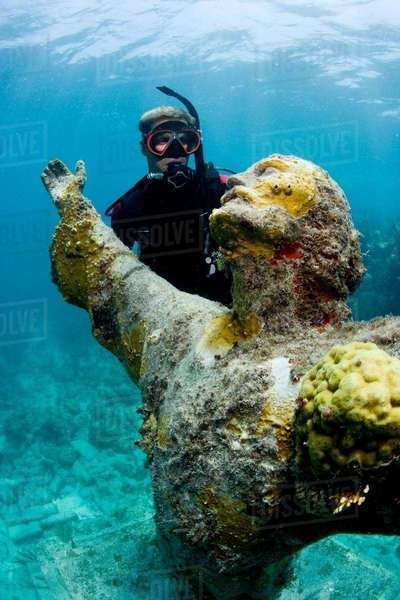 Scuba diver at Christ Statue. - Stock Photo - Dissolve