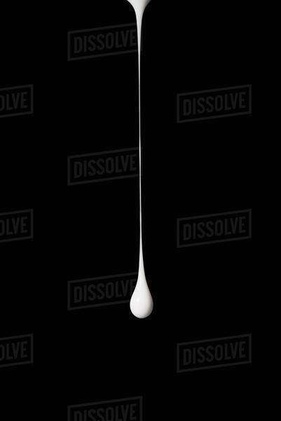 Drop of white paint - Royalty-free Stock Photo | Dissolve