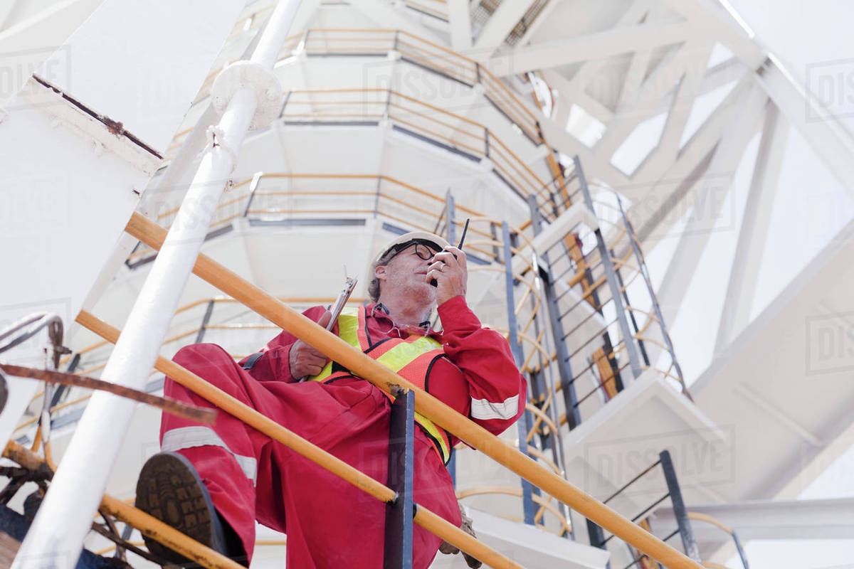 Engineer working on oil rig - Stock Photo - Dissolve
