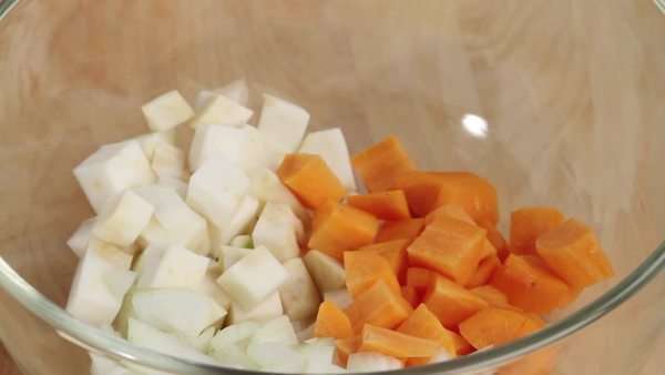 Roughly chopped root vegetables - Stock Video Footage - Dissolve