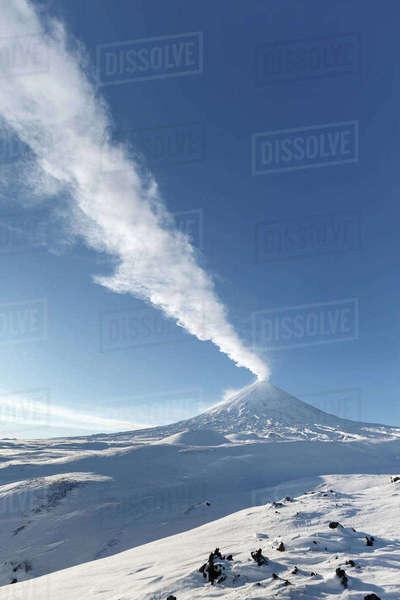 Winter volcanic landscape of Kamchatka: view of eruption active ...