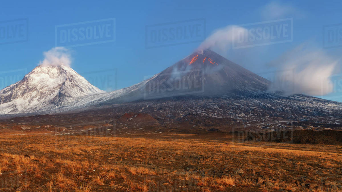 Autumn mountain landscape view at sunrise of eruption active ...