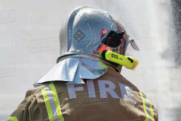 Back view of inscription Fire on uniform firefighter Emercom of Russia ...