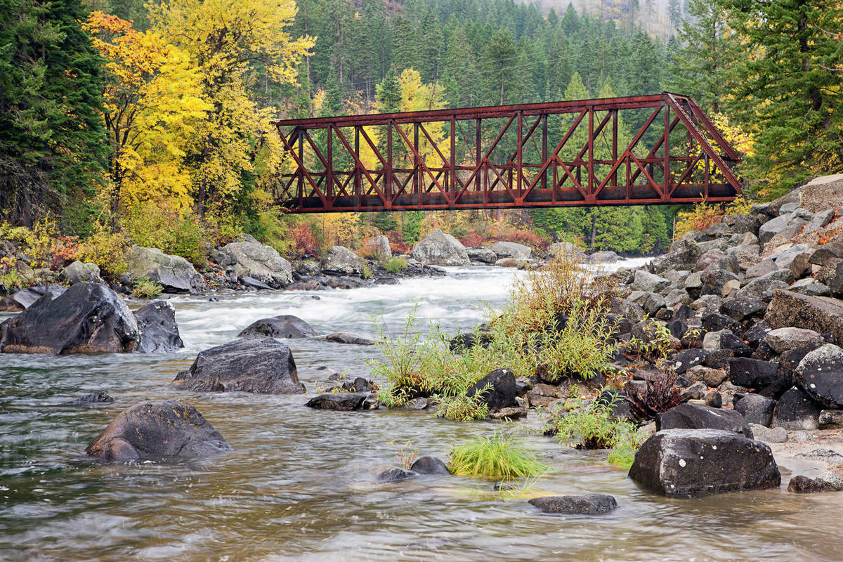 A steel bridge for walking spans over the Wenatchee River just west of ...