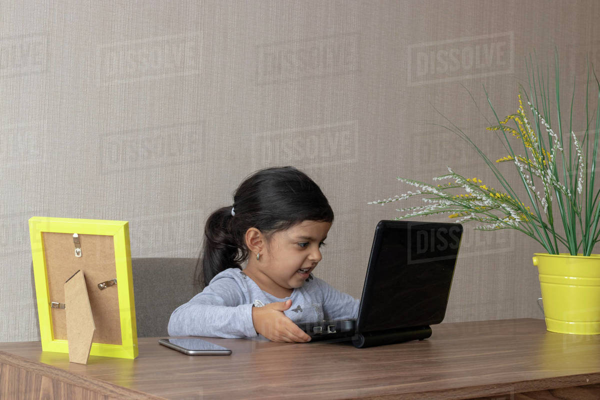 Cute little girl working in the office - Royalty-free Stock Photo ...