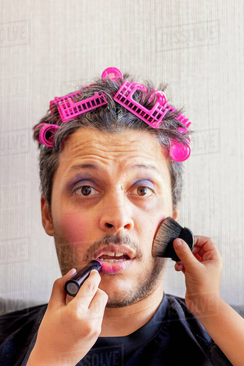 Handsome father is being makeup by the hands of his daughters - Royalty ...