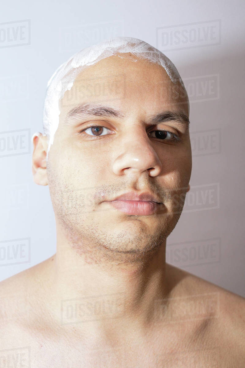 Man Shaving His Head Using White Foam - Royalty-free Stock Photo | Dissolve