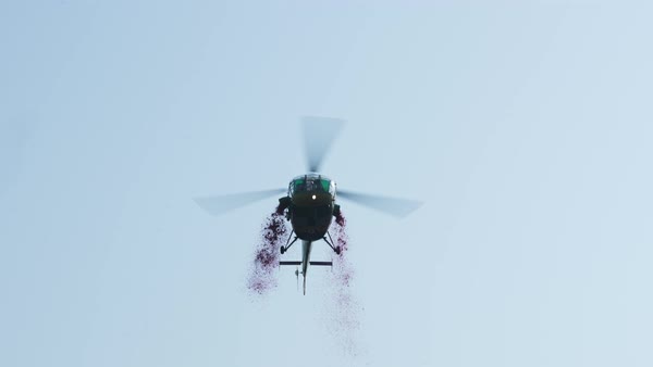 Flower petals by Indian Army Helicopter on Indian army officers passing ...