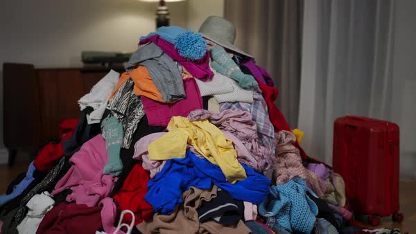 Pile of clothes in living room indoors with no people. Clean clothing ...