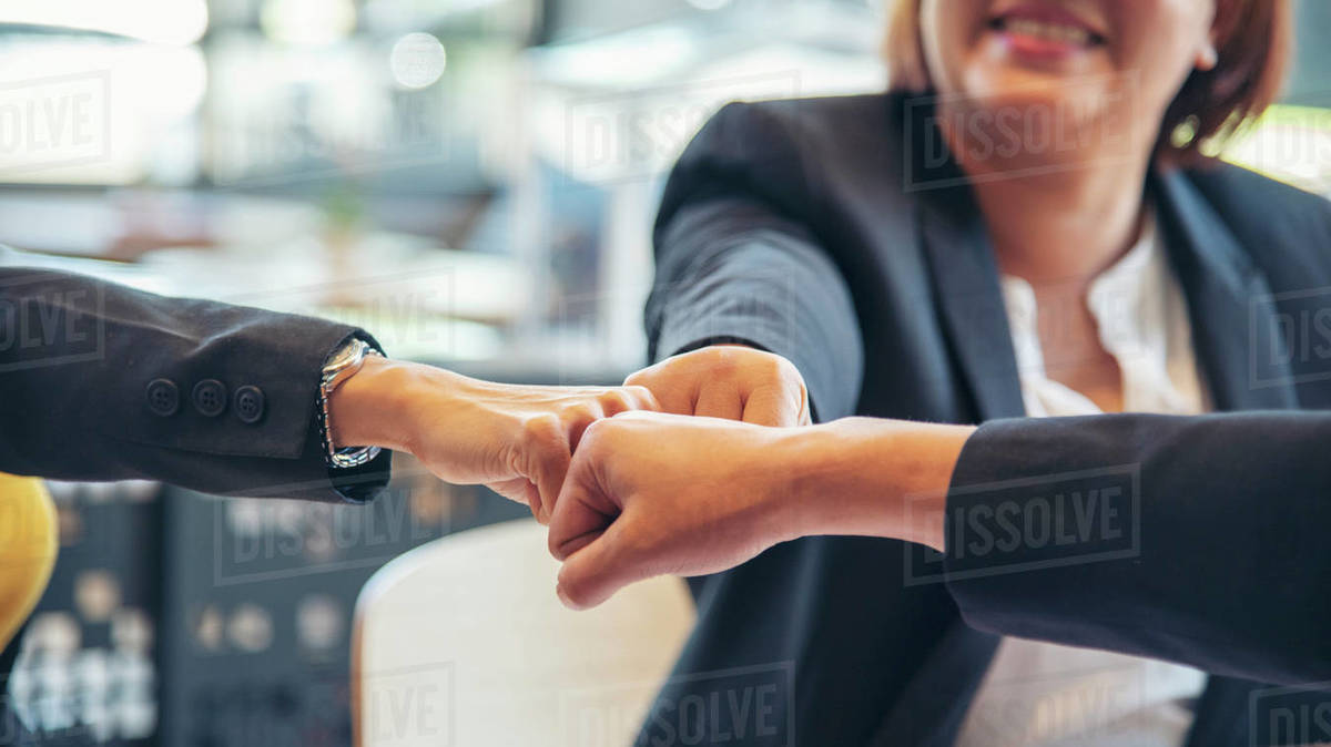 Group of diverse people fist bump hands together - Royalty-free Stock ...