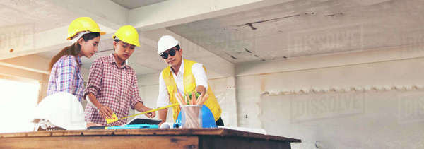 Banner Civil construction engineer team meeting on construction site ...