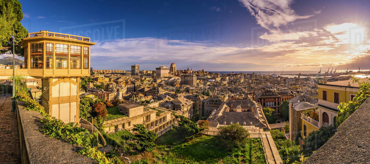 View of Genoa at sunset from "Spianata Castelletto", Italy - Royalty ...