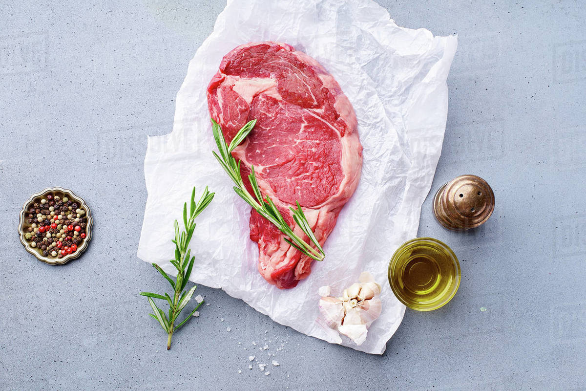 Top view Black Angus prime beef rib eye steak ready for barbecue on ...
