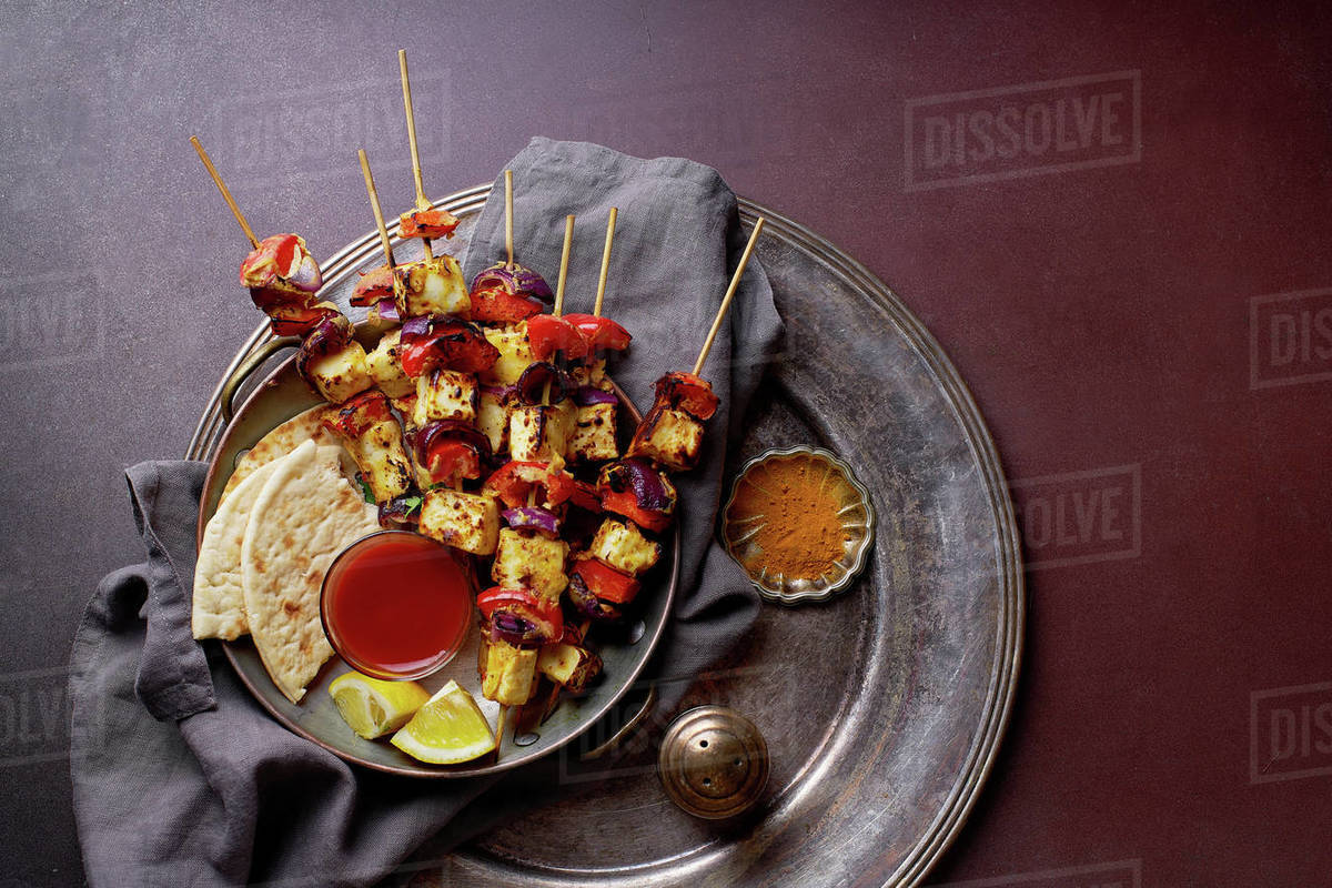 Paneer tikka starter kebabs with mint chutney and chapati. Traditional ...