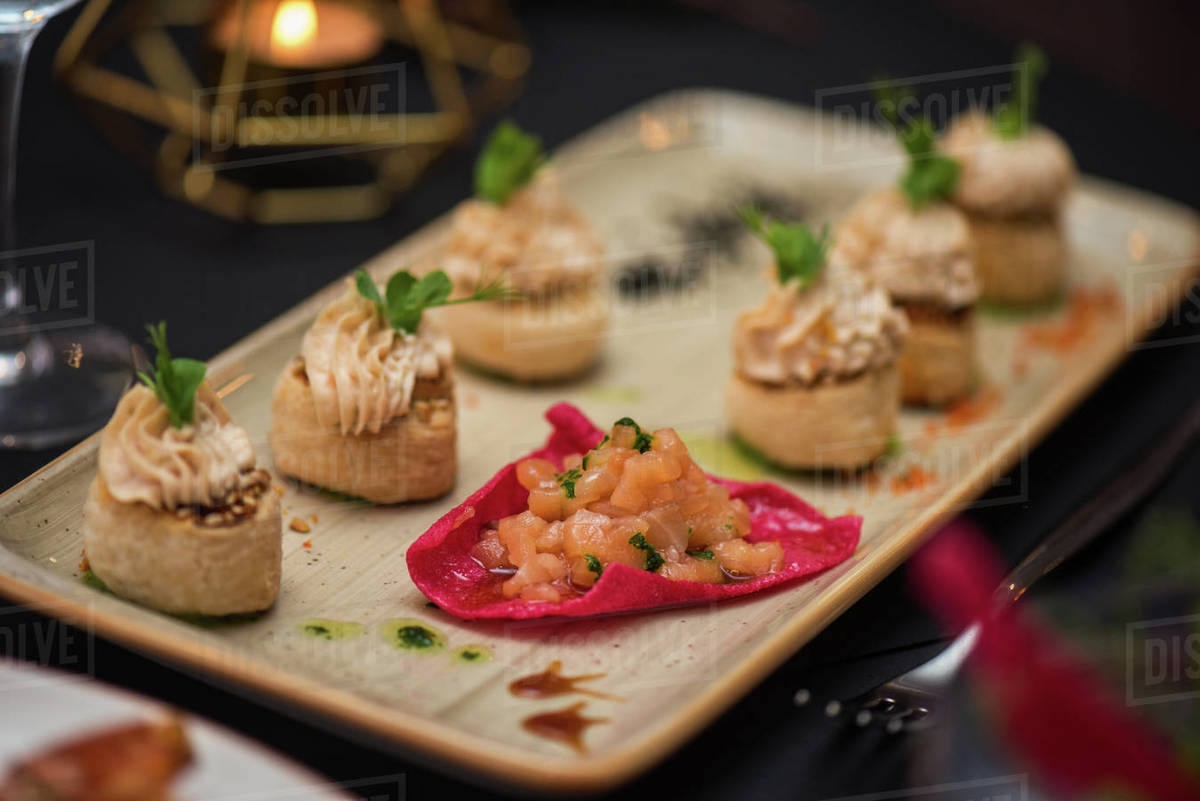 Kegs with salmon fish and cream sauce - Royalty-free Stock Photo | Dissolve