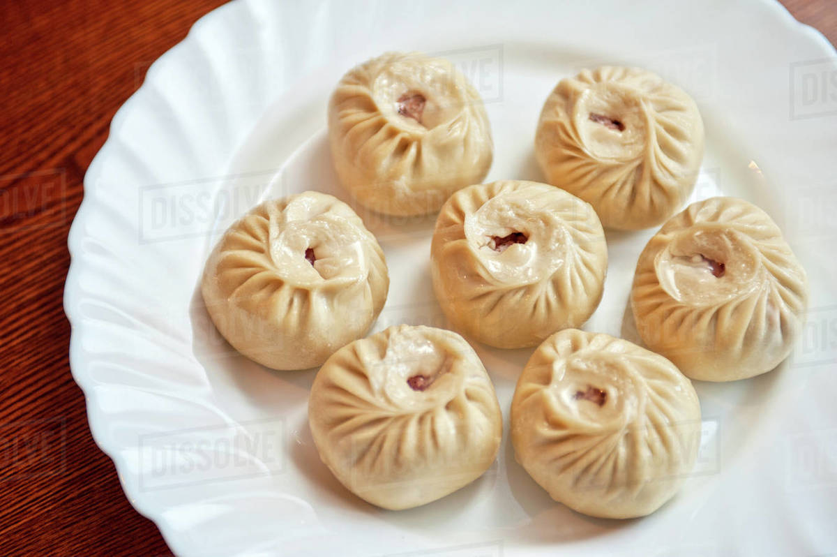 Buuza is a Buryat or Mongolian national dish, paste packets stuffed ...