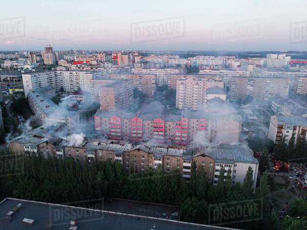 Aerial shots of a fire destroys a residential building in the city ...