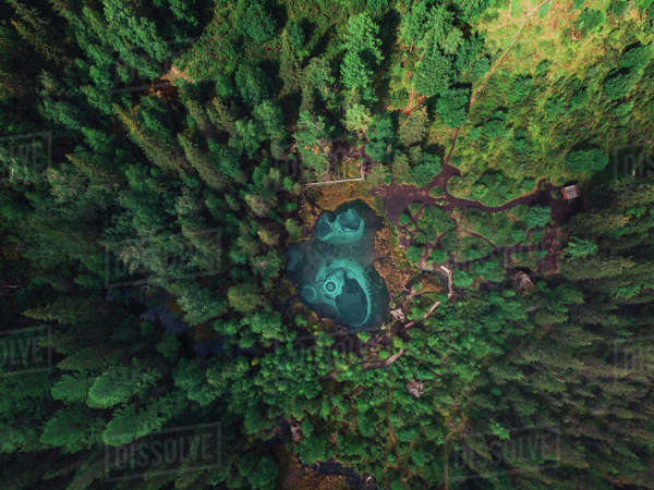 Beautiful Geyser (blue, silver) lake with thermal springs that ...