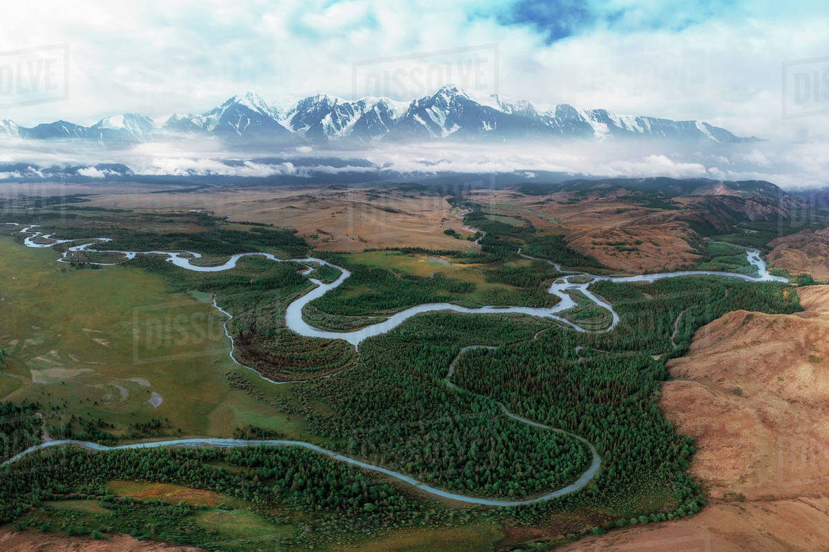 Kurai steppe and Chuya river on North-Chui ridge background. Altai ...