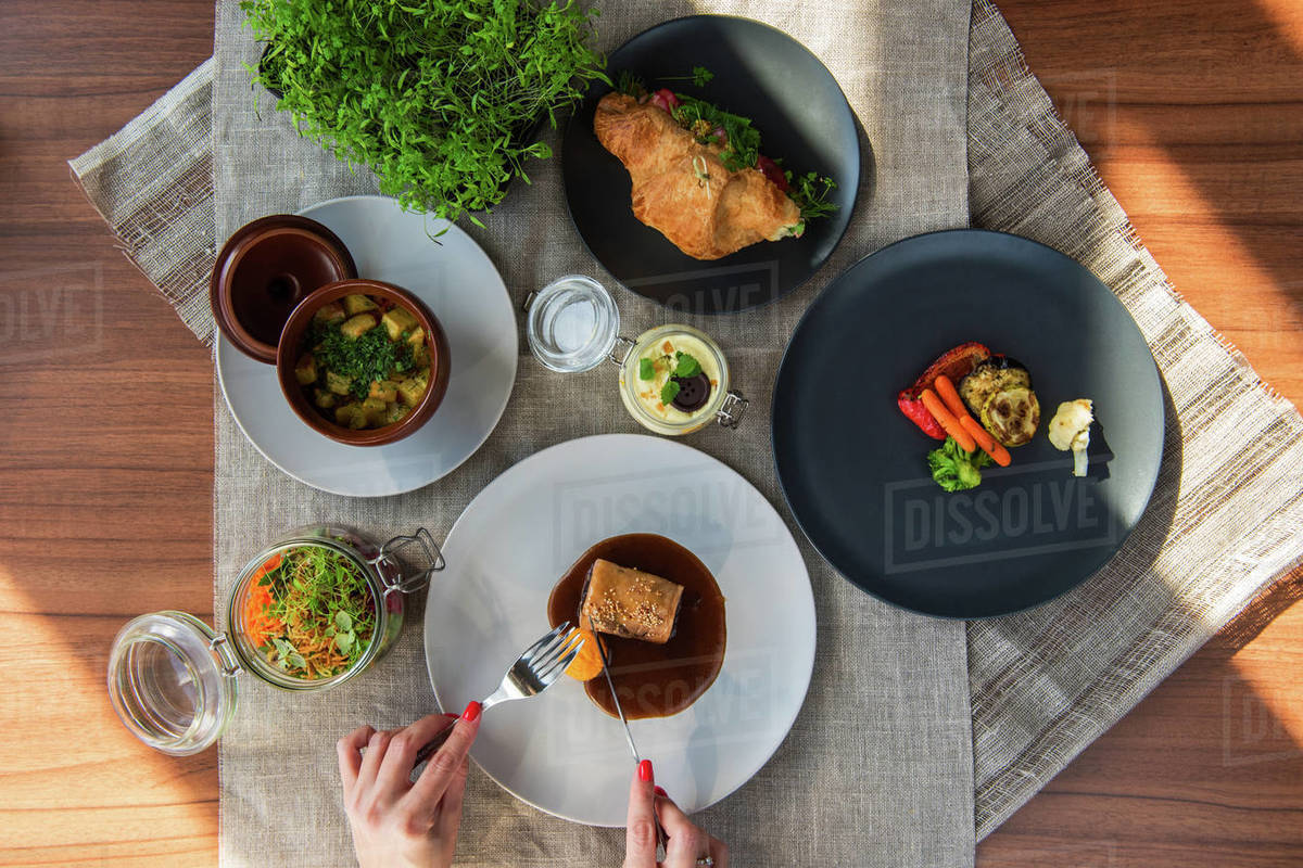Top view of business lunch - different tasty dishes on the table table ...