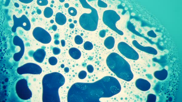 Dynamic liquid flow patterns. Time-lapse microscopy footage of liquids ...