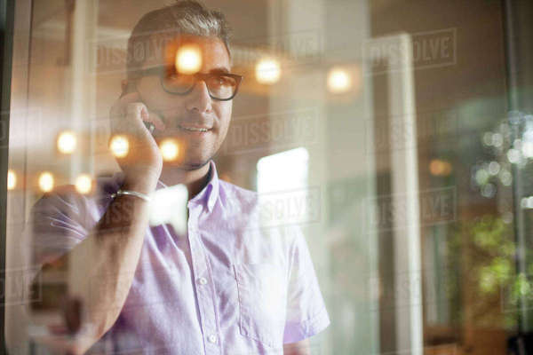 Man talking on phone - Royalty-free Stock Photo | Dissolve