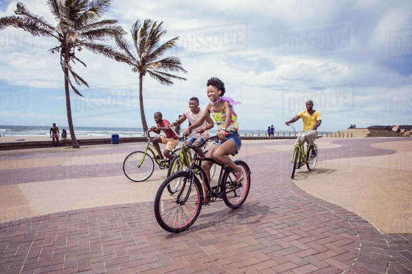 People riding bicycles along Durban Beachfront - Stock Photo - Dissolve