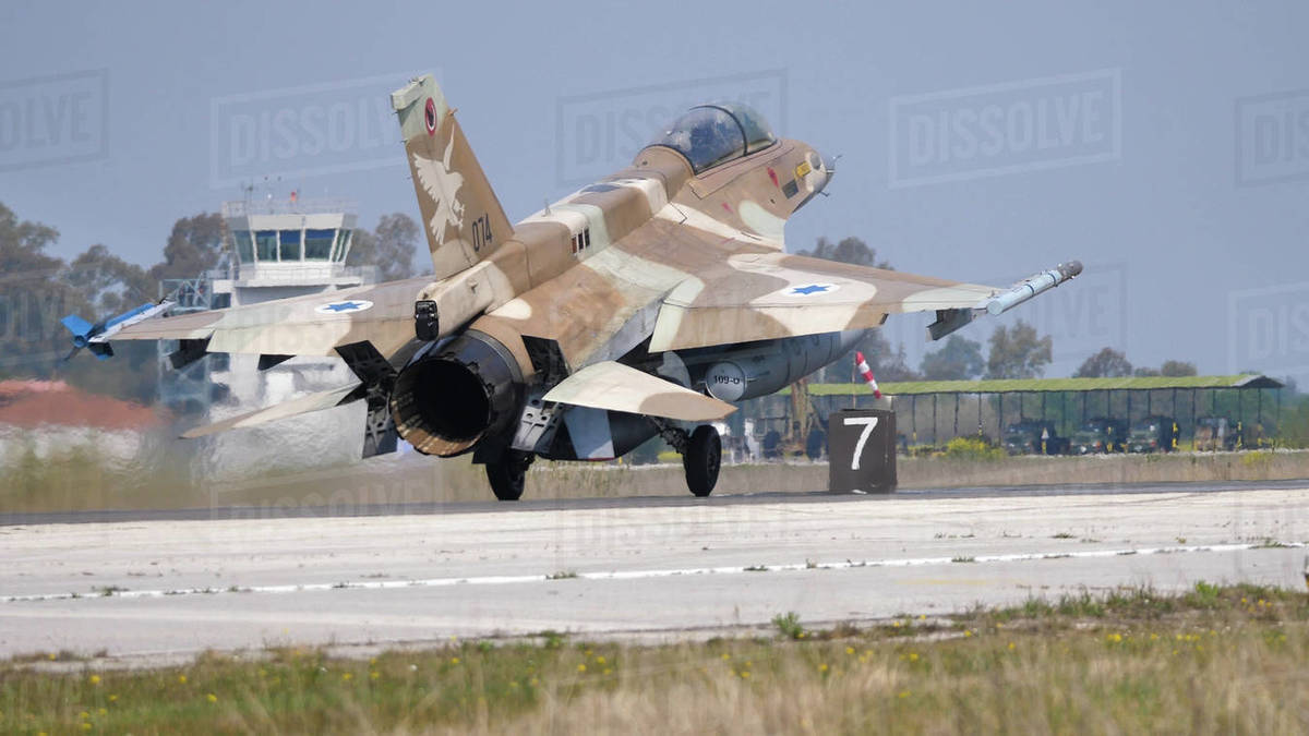 Armed combat jet plane of Israel army landing. General Dynamics F-16 D ...