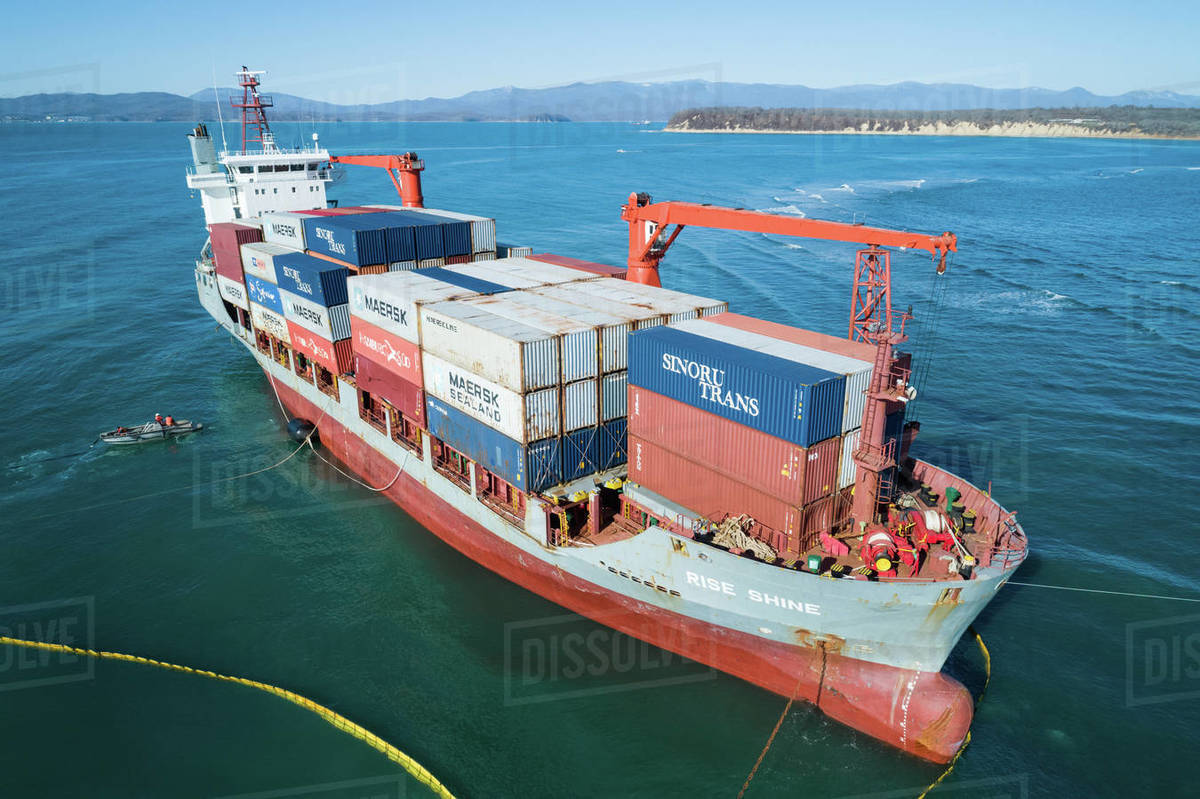 Aerial view of a RISE SHINE container cargo ship stands aground after a ...
