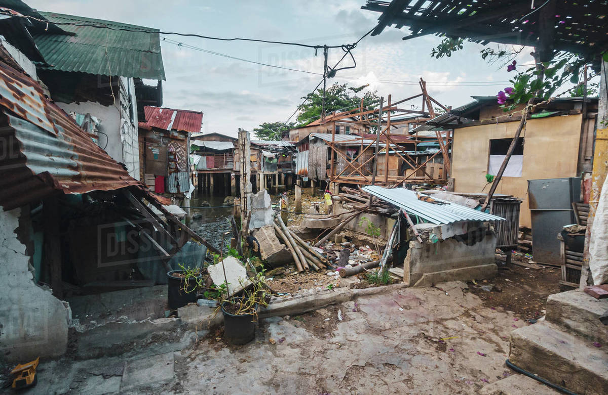 Life amidst challenges in a philippine slum community surrounded by ...
