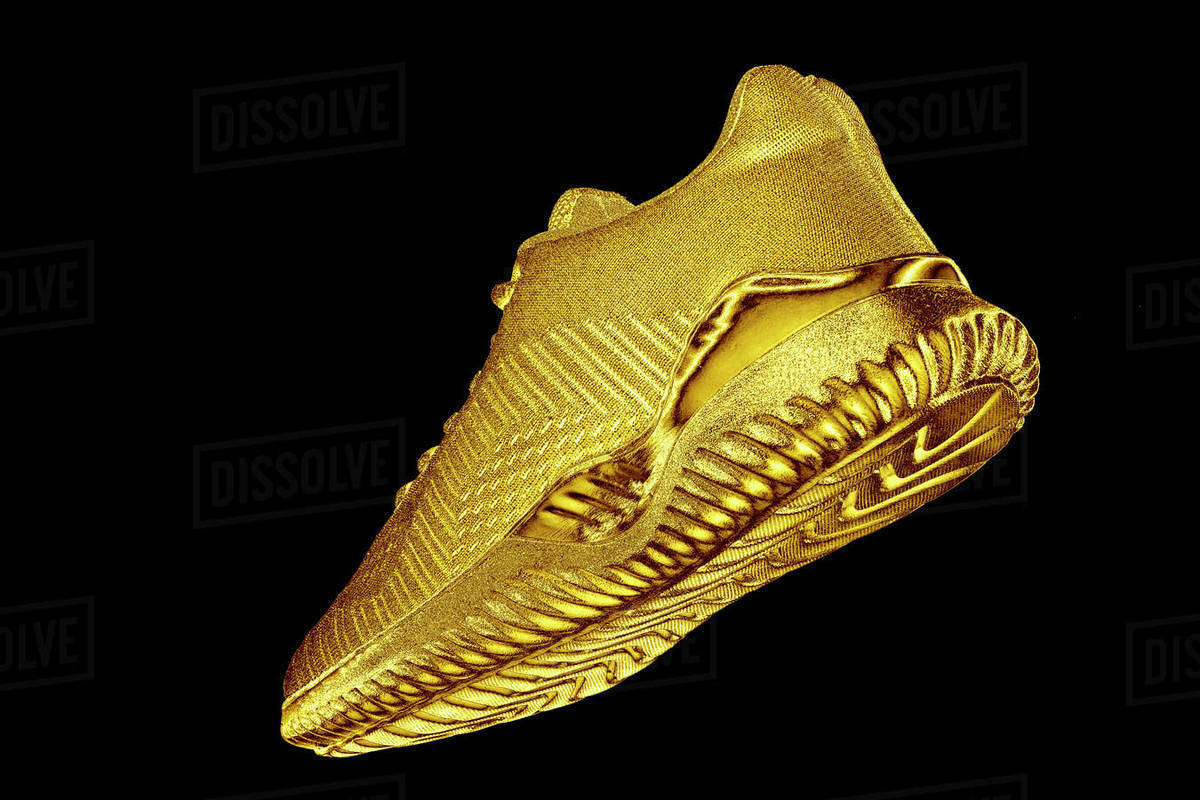 Sneakers. Golden sneaker on black background - Royalty-free Stock Photo ...