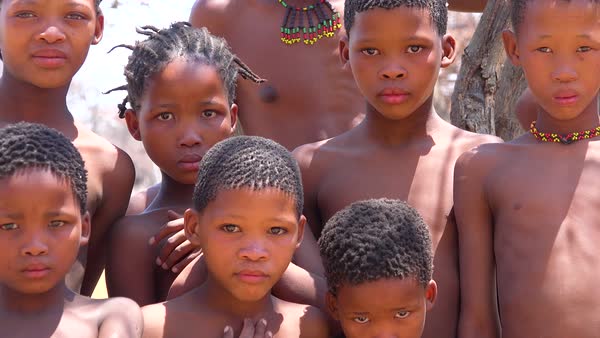 Beautiful African San tribesmen bushmen family portrait with children ...