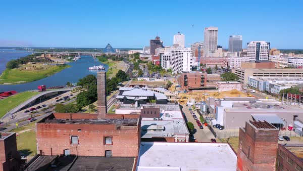 Aerial over Memphis Tennessee waterfront and Mud Island with Memphis ...