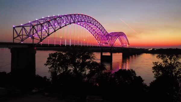 Good rising evening night aerial of Memphis Hernando De Soto Bridge ...