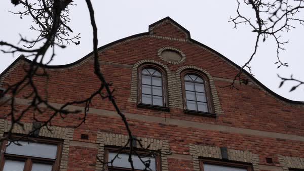 18th Century European Brick Building Exterior and Tree Branches Winter ...