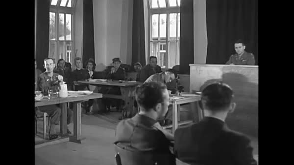 1940s - The military tribunal overseeing the Dachau trials listens to a ...